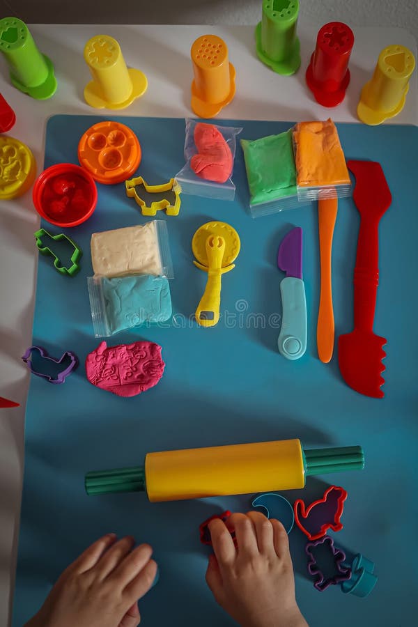 Playdough and Tools on Blue Background Stock Photo - Image of cutting ...