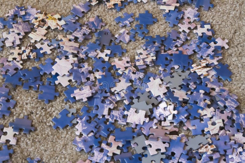 Pieces of Puzzle Blocks on Carpet Stock Photo - Image of chaos, idea ...
