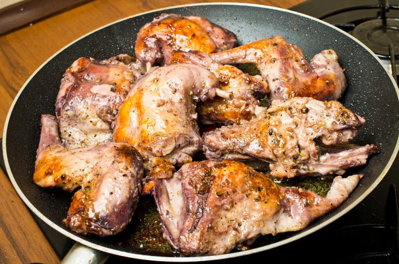 Pieces of the Rabbit on the Pan Stock Image - Image of roasted, food ...