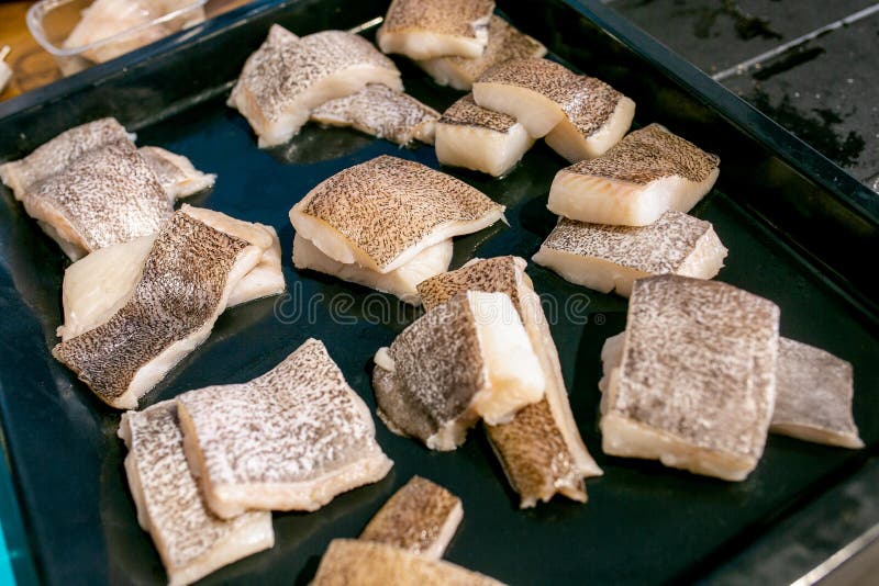 Pieces of Raw Fish on a Baking Sheet. Master Class in the Kitchen. the ...