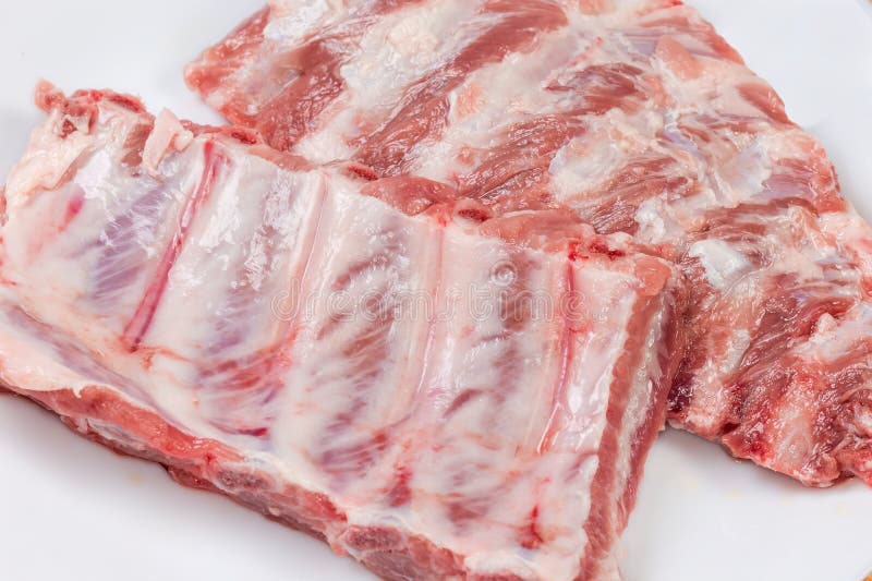 Pieces of Raw Pork Ribs on Light Background Close-up Stock Image ...