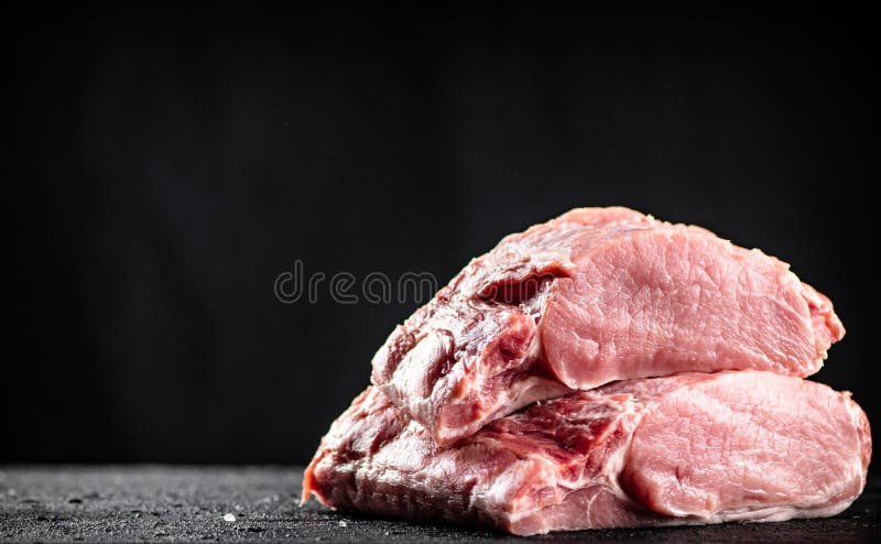 Pieces of Raw Pork on the Table. Stock Image - Image of uncooked ...