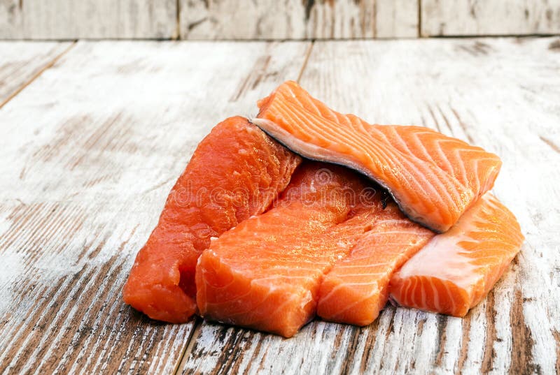 Fresh Raw Salmon Fish Pieces On Plate Isolated Stock Photo - Image of ...