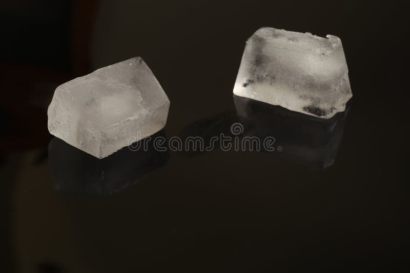 Pieces of Rectangular Ice on a Black Background. Stock Image - Image of ...