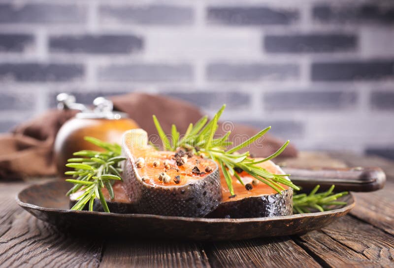 Pieces of Red Fish Fillet. Salmon Fillet with Rosemary Stock Image ...