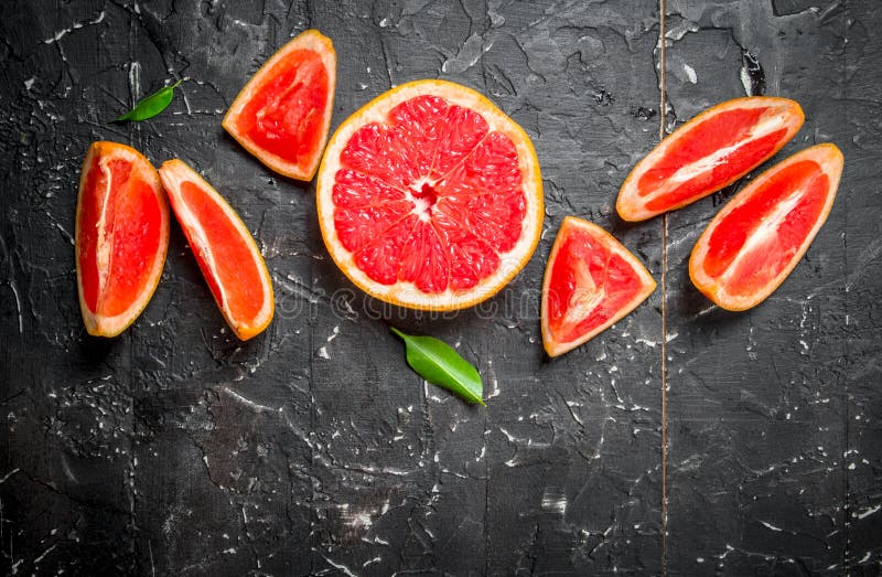 Pieces of ripe grapefruit stock photo. Image of healthy - 141790822