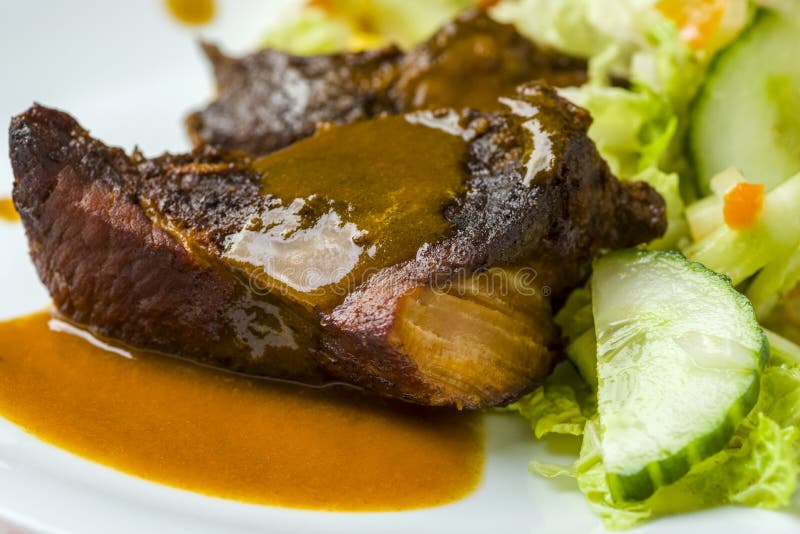 Pieces of Roasted Pork Meat and Vegetable Salad Stock Photo - Image of ...