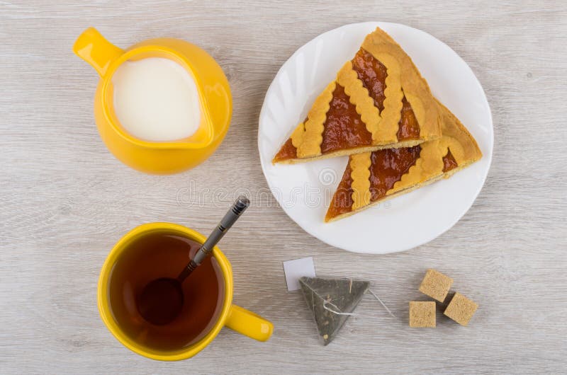 Pieces of Shortbread Pie, Milk Jug, Sugar and Tea Stock Image - Image ...
