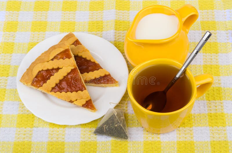 Pieces of Shortbread Pie, Tea and Milk on Tablecloth Stock Photo ...