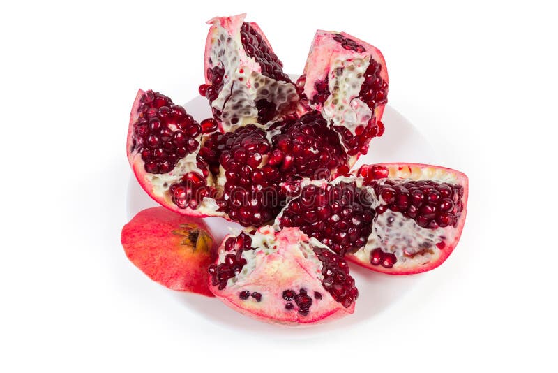 Pieces of Splitted Pomegranate Fruit on the White Dish Stock Image ...