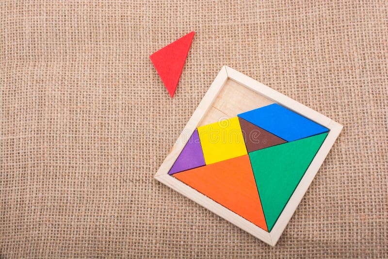 Pieces of a Square Tangram Puzzle Stock Photo - Image of education ...