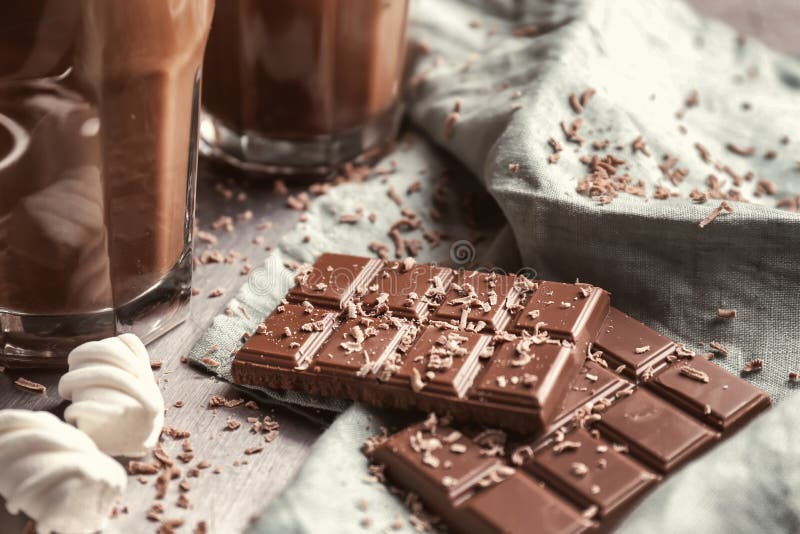 Pieces of Tasty Chocolate with Cacao Drink on Table Stock Photo - Image ...