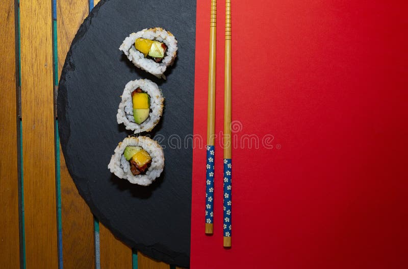 Pieces of Vegetarian Sushi on a Blue and Red Background Stock Photo ...