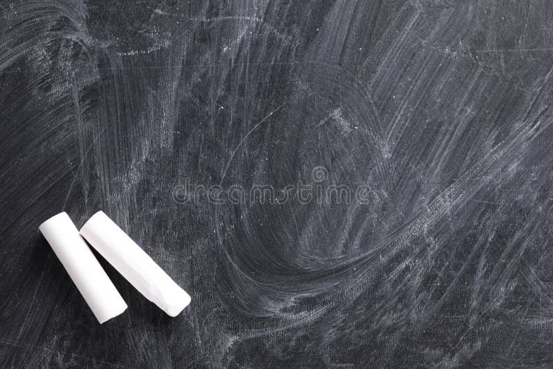 Pieces of White Chalk on Blackboard. Space for Text Stock Image - Image ...