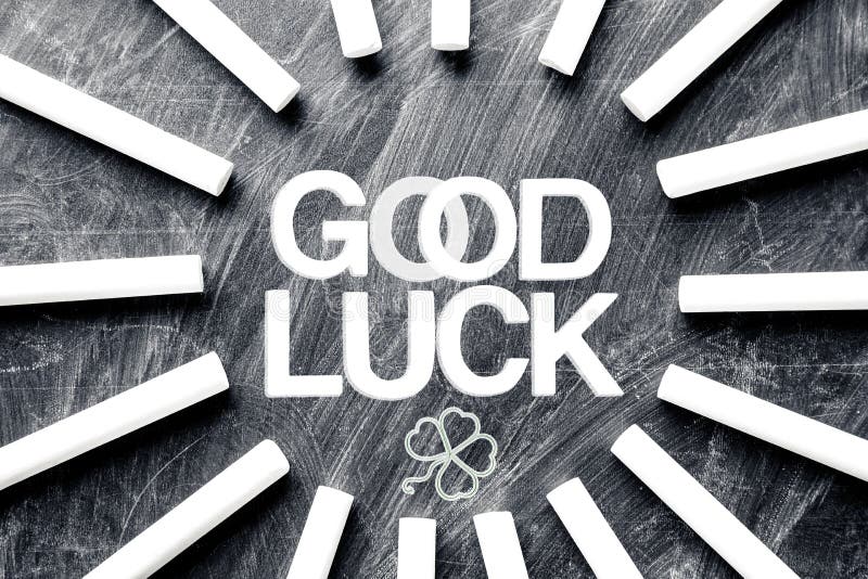 Pieces of White Chalk and Phrase GOOD LUCK on Blackboard Stock Photo ...