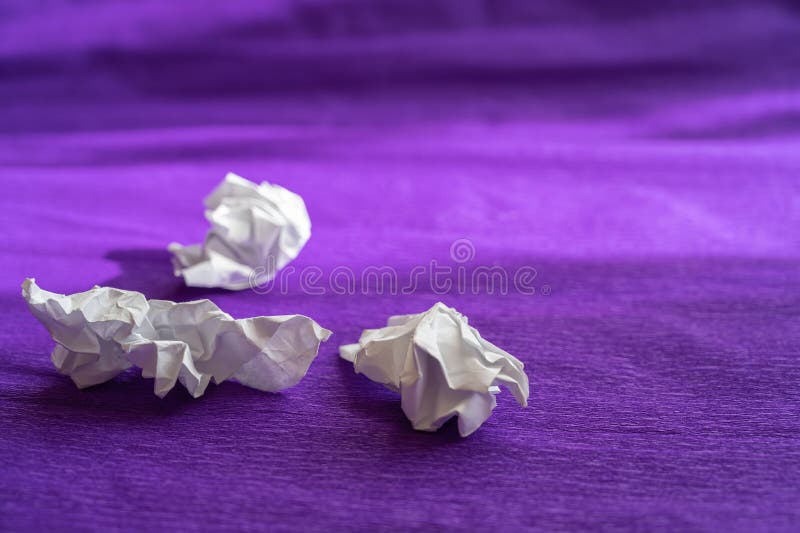 Pieces of White Crumpled Paper Against a Lilac Background Stock Photo ...
