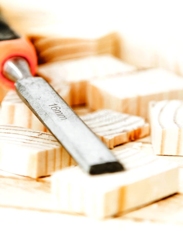 Pieces of Wood with Chisel on the Boards Background Stock Photo - Image ...