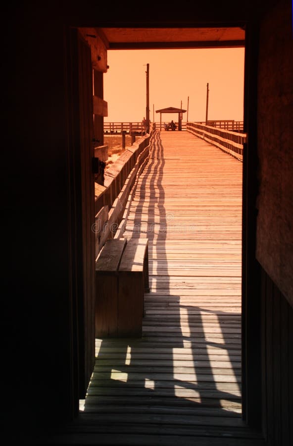Pier on the Beach Shot from Inside a Cabin Room. Stock Image - Image of ...