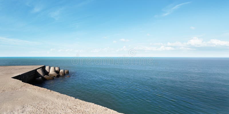 The Pier with Breakwaters Goes Out To Sea Stock Photo - Image of ...
