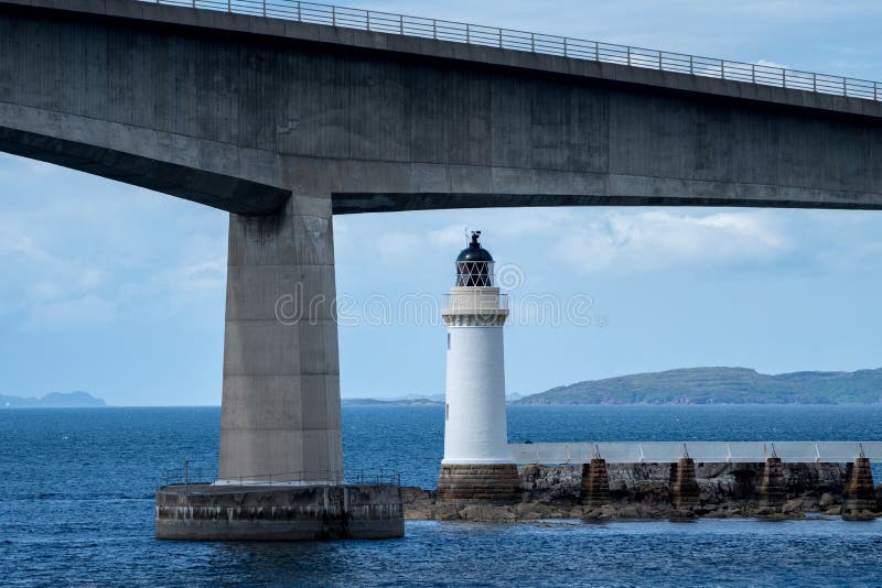 A bridge and a lighthouse stock photo. Image of lighthouse - 149126798