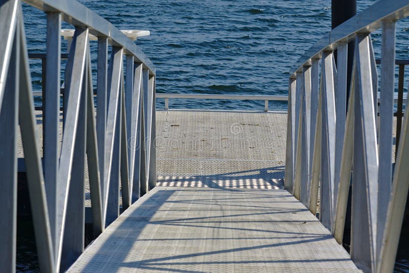 Pier Bridge with Silver Gate Going Down Direction Stock Photo - Image ...