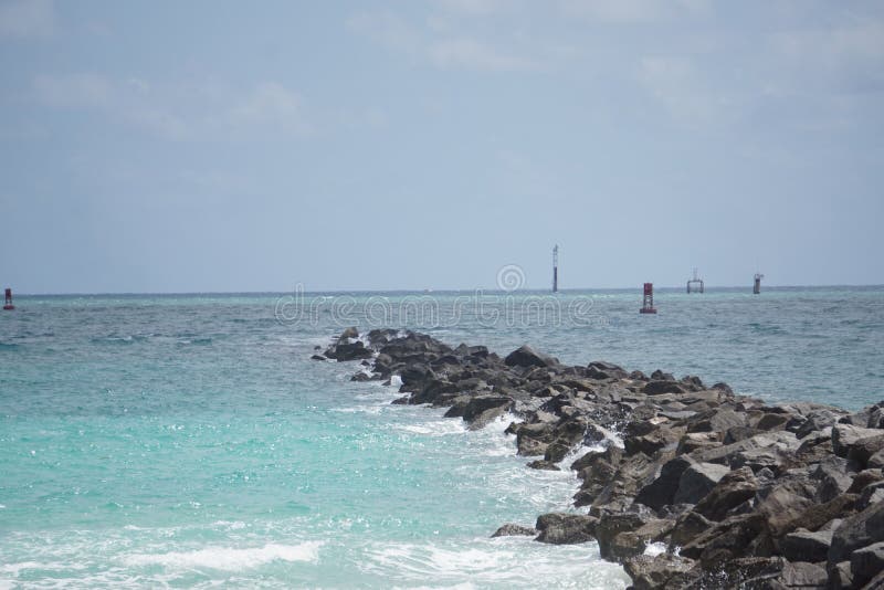 Pier Divider with Rocks on Miami Beach Stock Photo - Image of miami ...