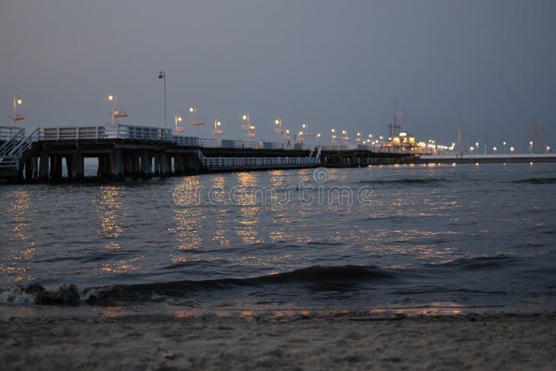 Pier in evening lighting stock image. Image of scene - 58222537