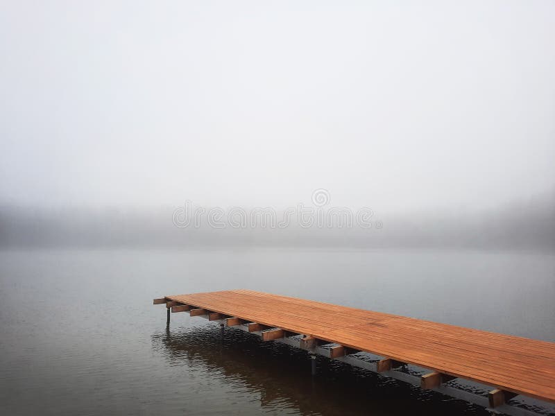 Pier in the fog stock photo. Image of travel, season - 238026758