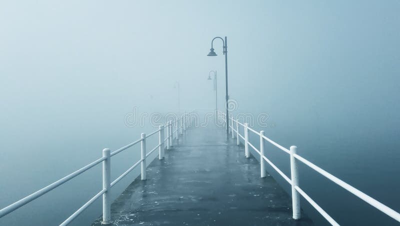 Pier in the fog stock image. Image of afternoon, horizon - 66605651