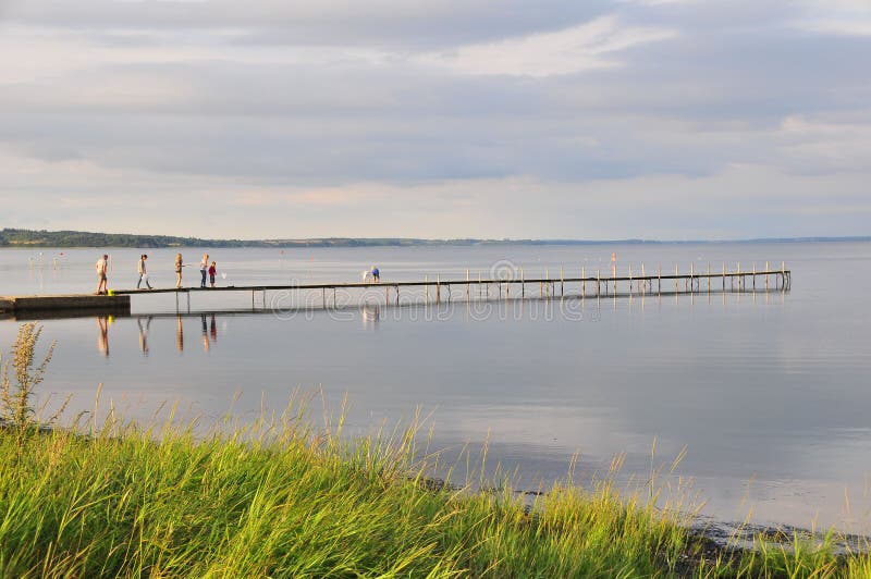 Pier in a lake in Denmark stock image. Image of ocean - 261159055