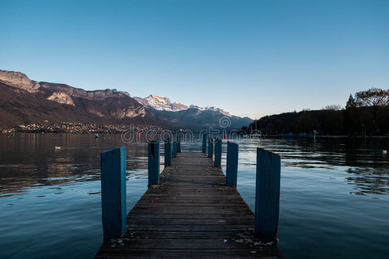 Pier on the Lake with Reflection during Daytime Stock Photo - Image of ...