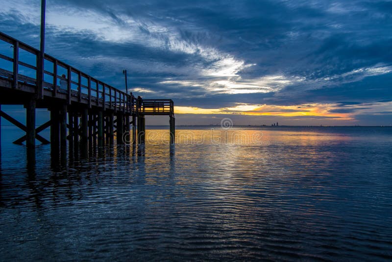 Pier on Mobile Bay at Sunset Stock Photo - Image of coast, tranquil ...