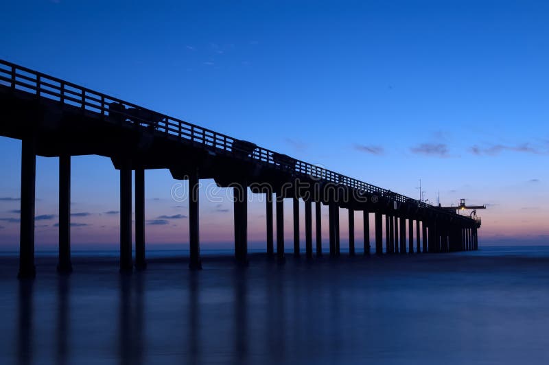 Pier at night stock image. Image of beach, water, pier - 2449007