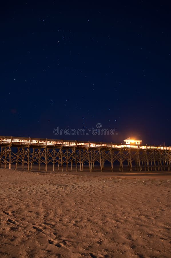 Pier at Night stock photo. Image of pier, island, clouds - 24640332
