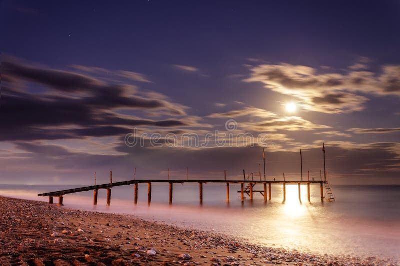 Pier at Night stock photo. Image of lights, pier, concrete - 63948678
