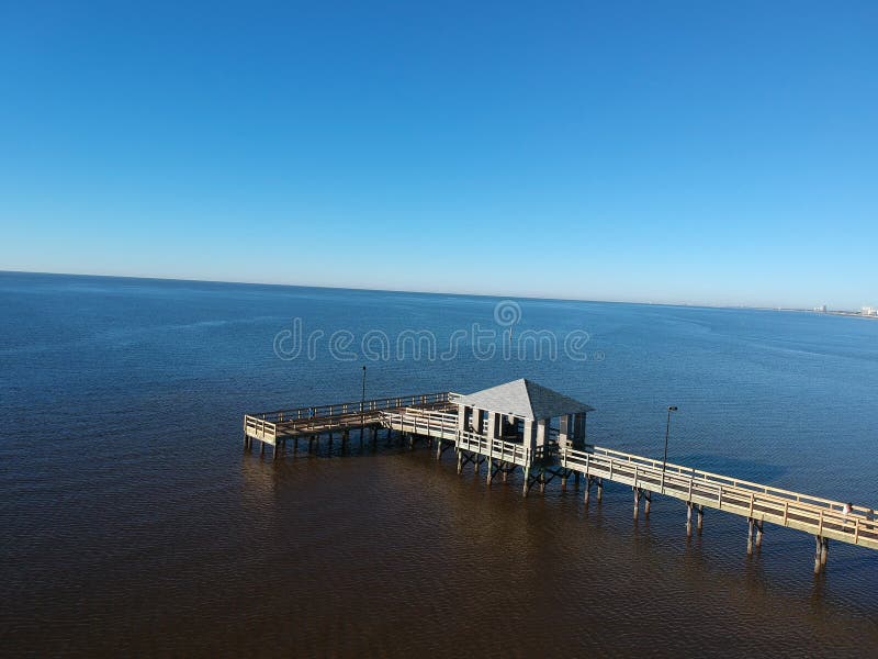 Pier on the Ocean stock image. Image of relaxing, birds - 135939425