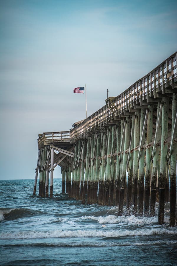 Pier over Waves stock image. Image of waves, lines, clouds - 39945409