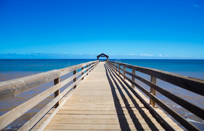 Pier in Pacific Ocean in Hawaii Stock Photo - Image of seascape, wood ...