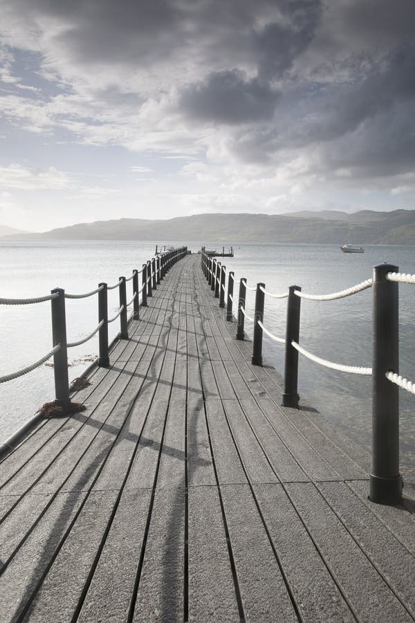 Pier in Scotland stock image. Image of dramatic, water - 27747477