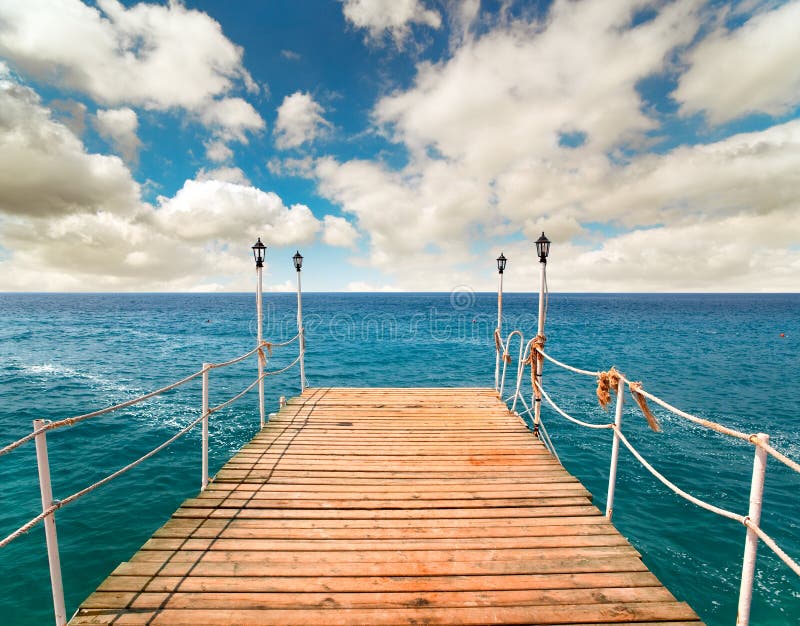 Pier and the sea stock image. Image of peaceful, wooden - 22186711