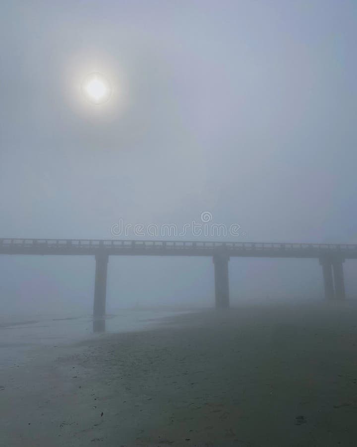 Pier in the sea fog stock image. Image of embraces, pier - 306165139