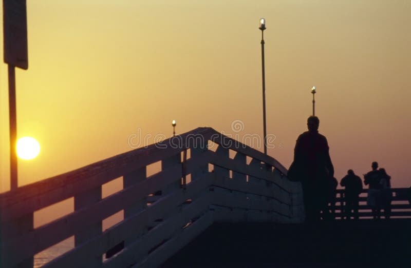 Pier at sunset stock image. Image of pier, sunset, fishing - 15318447