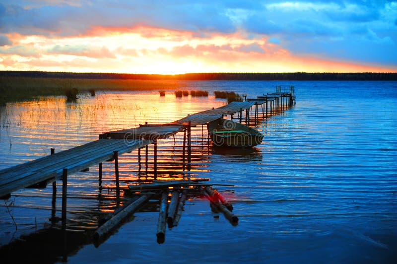 Pier at sunset stock image. Image of blue, dramatic, coast - 16791165