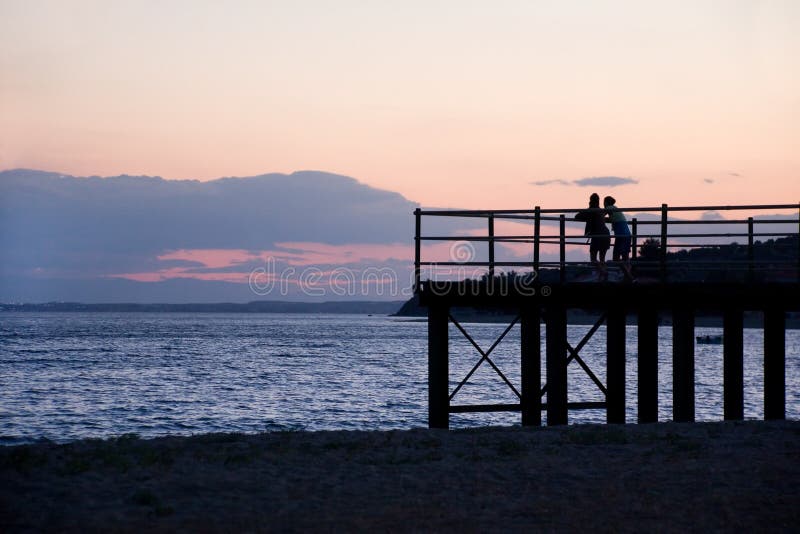 Pier at Sunset stock photo. Image of lighting, silhouette - 23238774