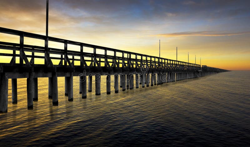 Pier in sunset stock image. Image of diminishing, dawn - 26419785