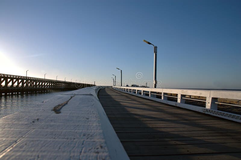 Pier at sunset stock image. Image of light, outdoors, skies - 641535