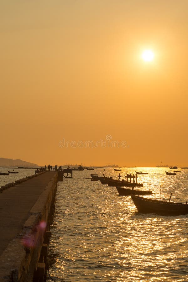 Pier during sunset stock image. Image of golden, background - 68582285