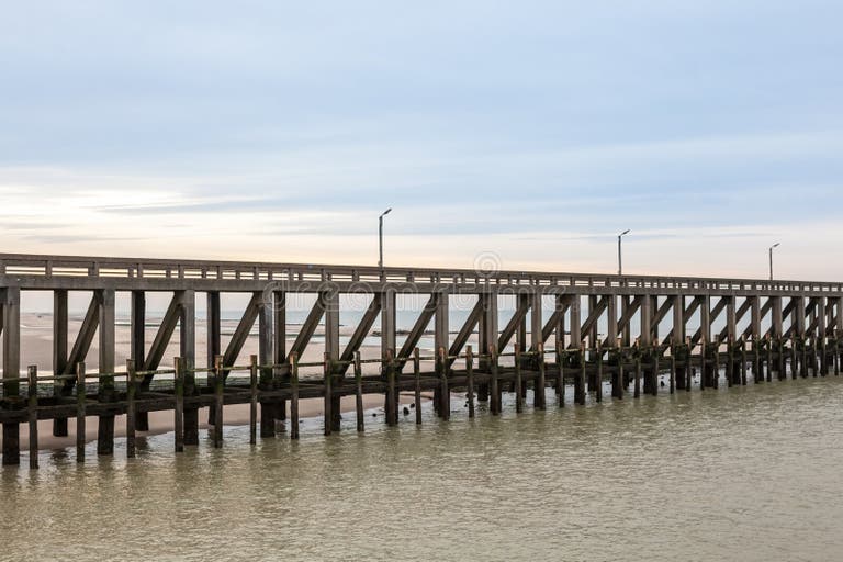 The Pier Whit Light Pole at the Sea Stock Image - Image of sunset ...