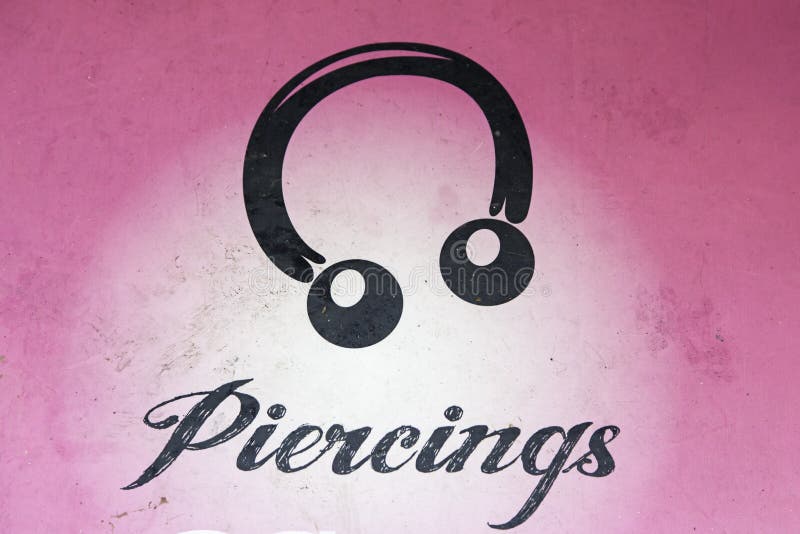 Piercing on a wall stock photo. Image of building, letter - 51313970