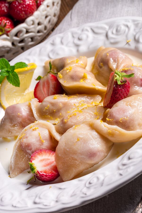 Pierogi with strawberries stock photo. Image of delicious - 56100158